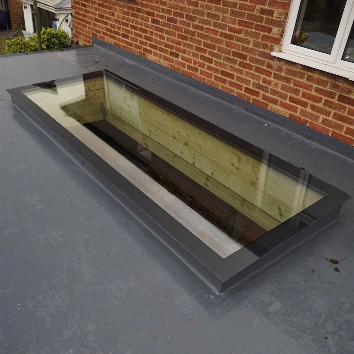 Our triple-glazed frameless skylights feature a sleek, modern design ...